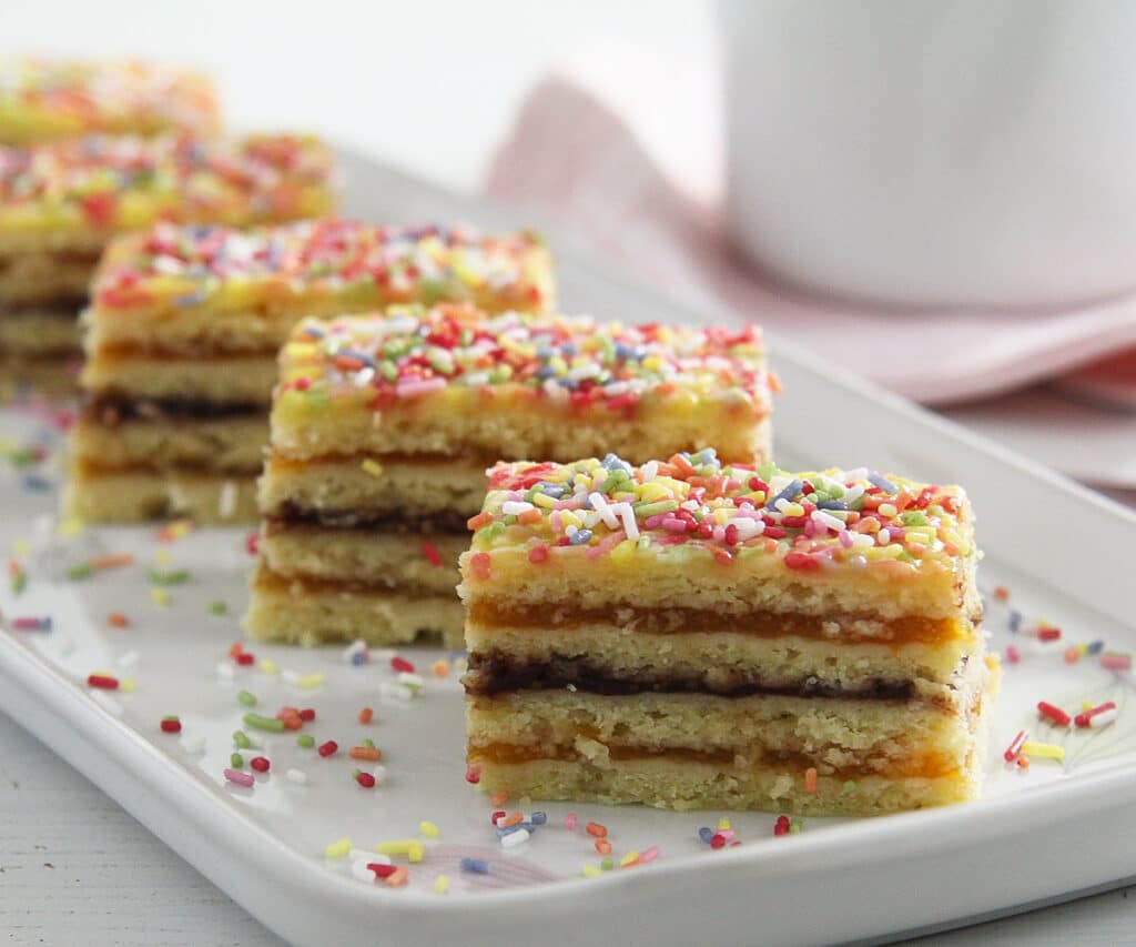 Layered Cake with Jam Filling – Romanian Harlequin Cake - Where Is My Spoon